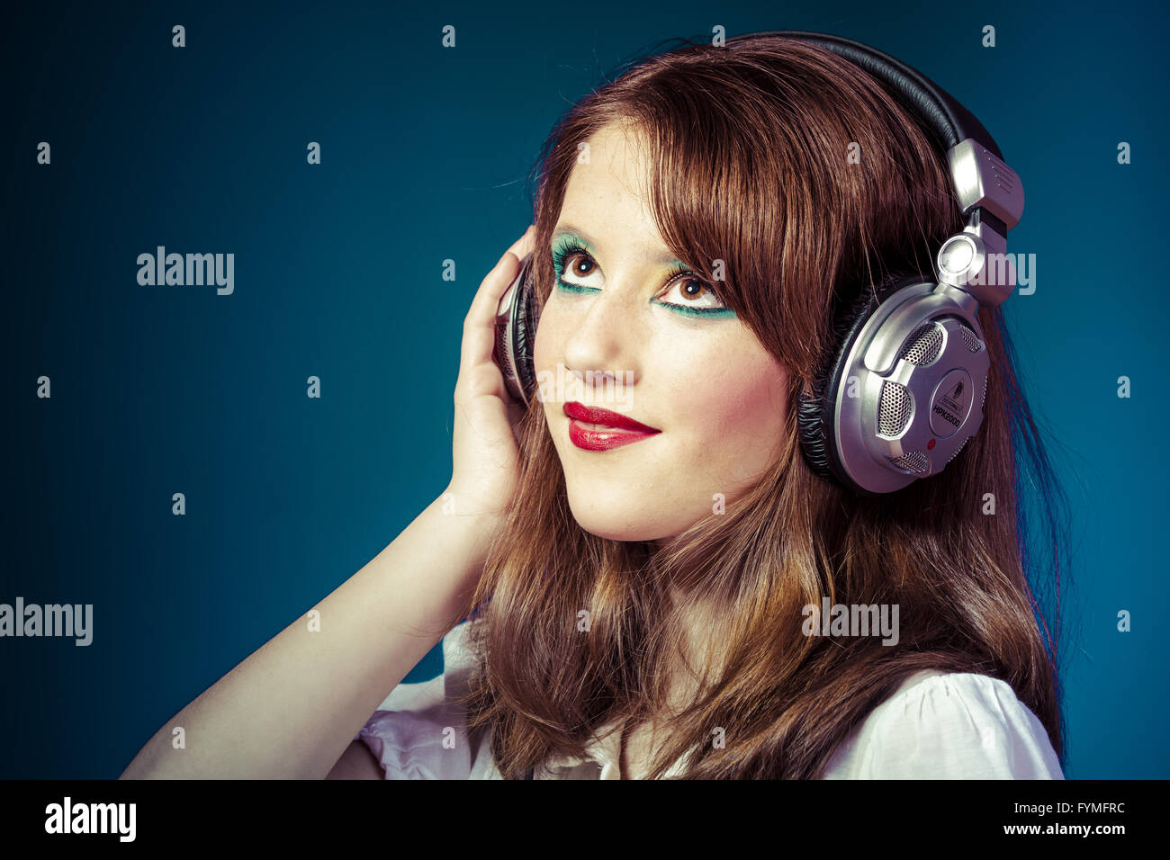 redhead teenager listening to rock music headphones Stock Photo - Alamy