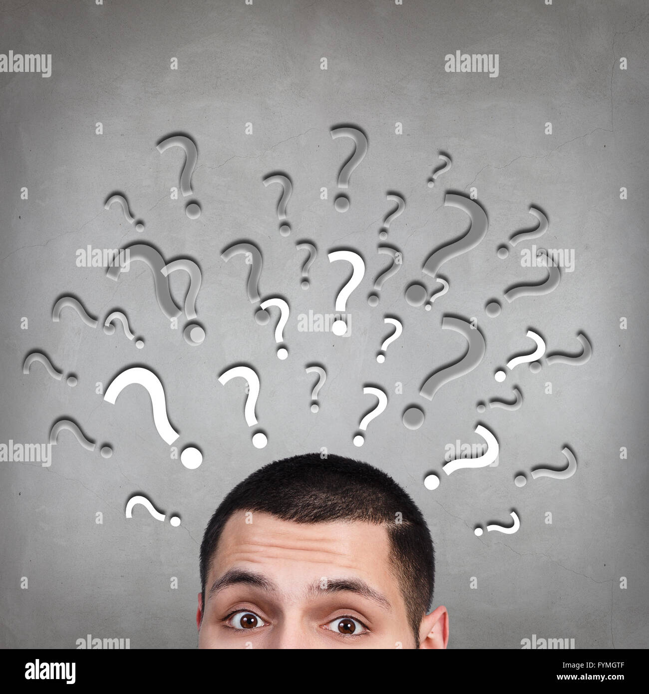 Handsome man has too many questions Stock Photo - Alamy