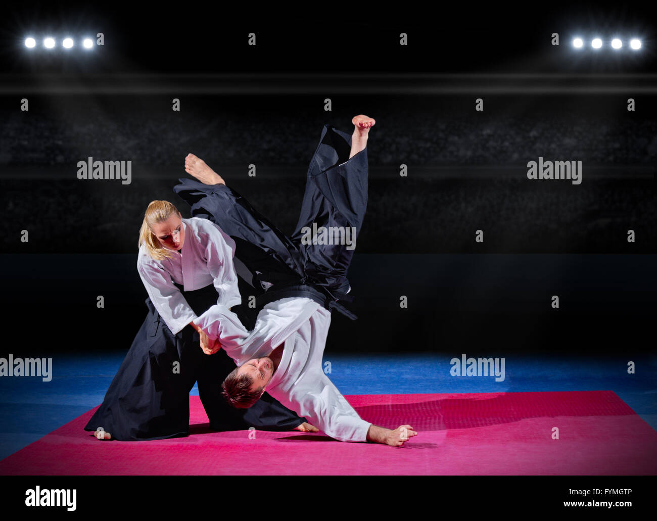 Fight between two martial arts fighters at sports hall Stock Photo - Alamy