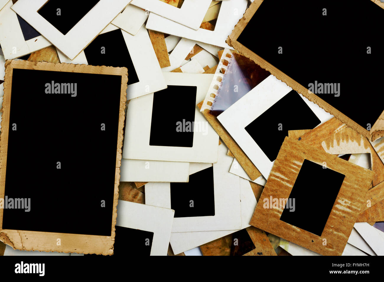 Set of old slides, photos and film on the table Stock Photo - Alamy