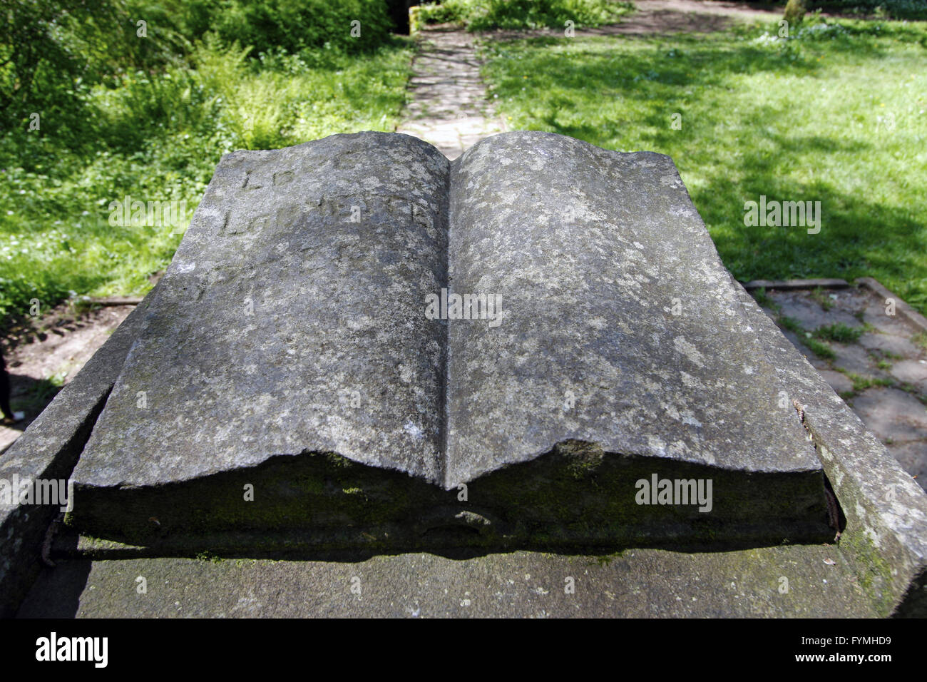 Old carved stone book Stock Photo - Alamy