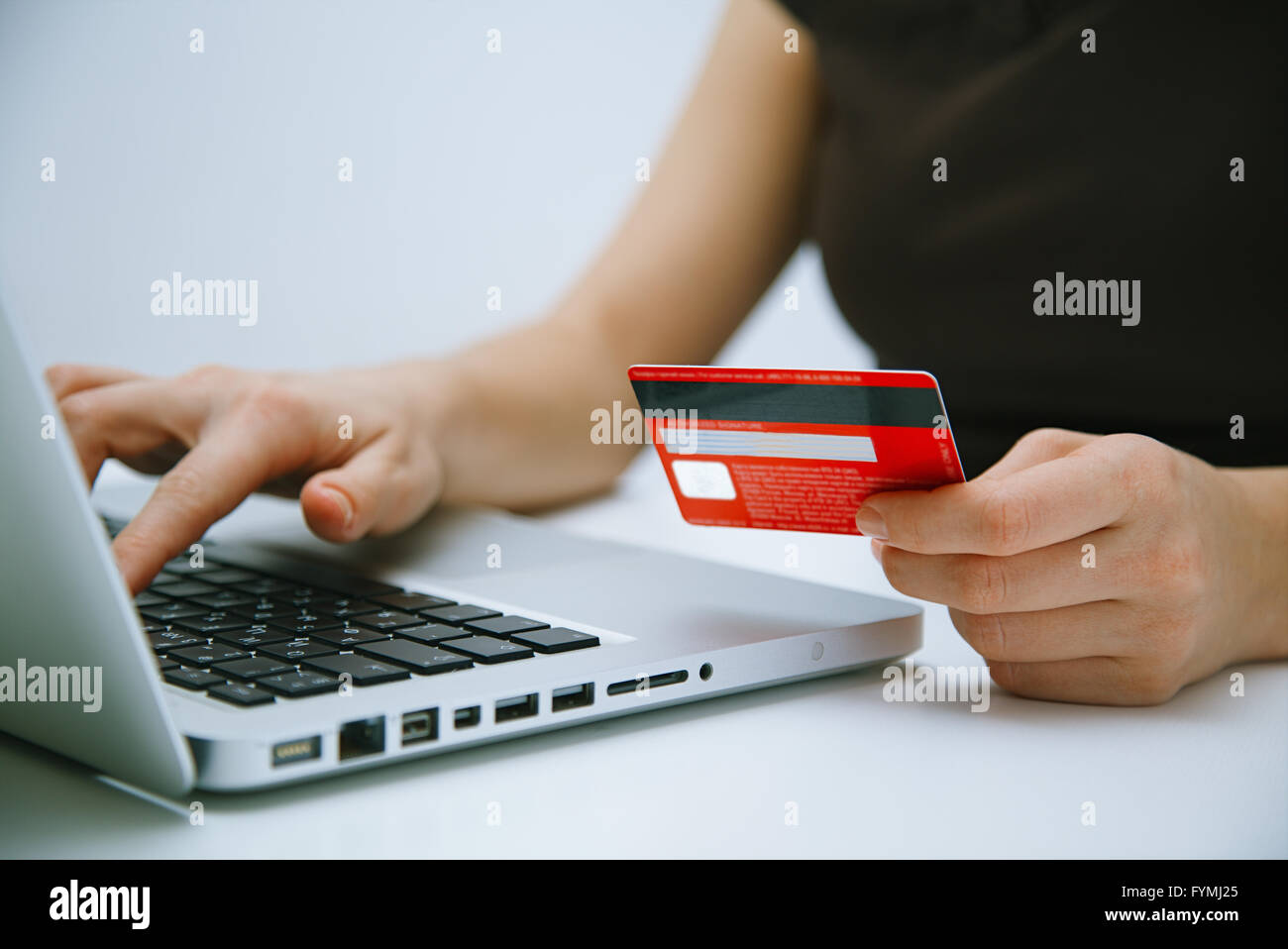 Young female online purchase credit hi-res stock photography and images ...