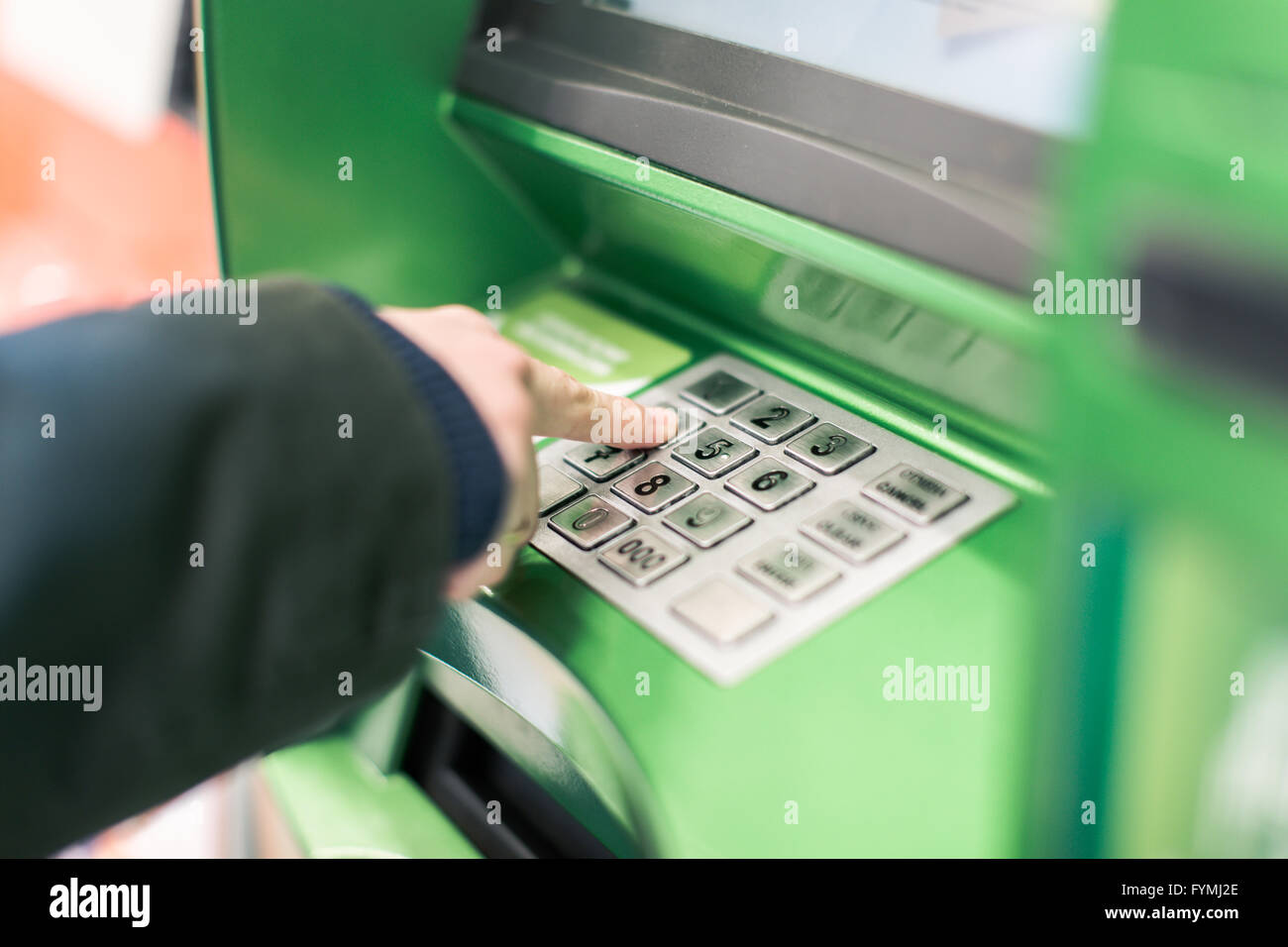 Woman entering code pin hi-res stock photography and images - Alamy