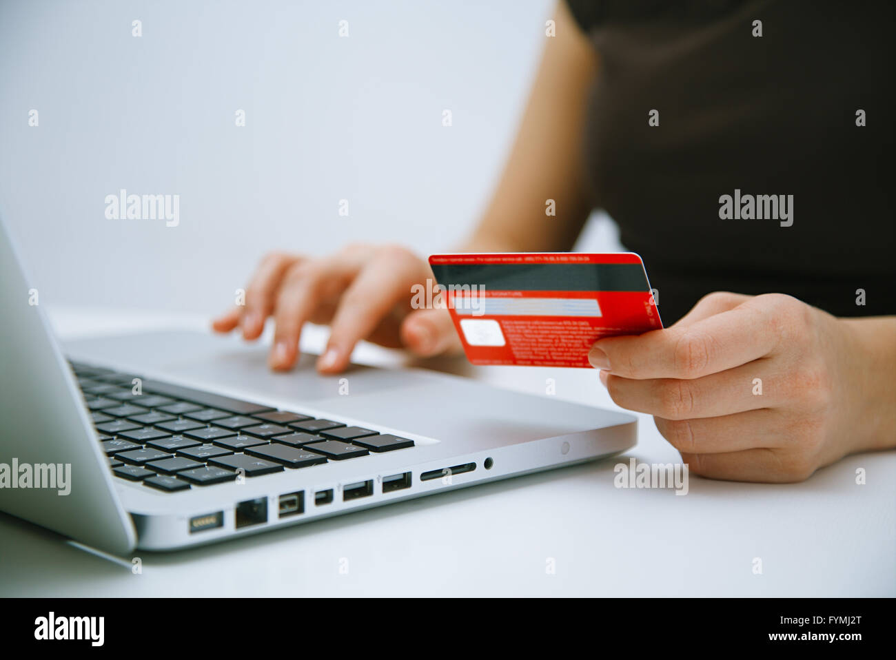 Woman paying credit card online hi-res stock photography and images - Alamy