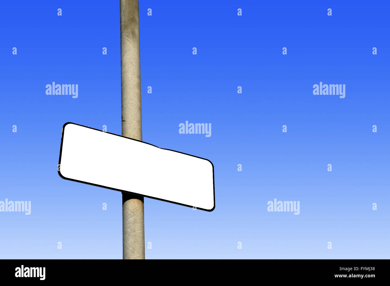 Blank white sign against a blue background Stock Photo - Alamy