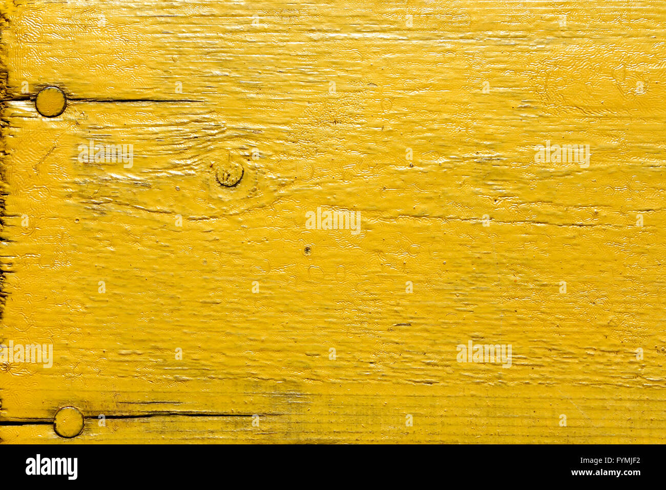 Painted yellow wooden desk Stock Photo - Alamy