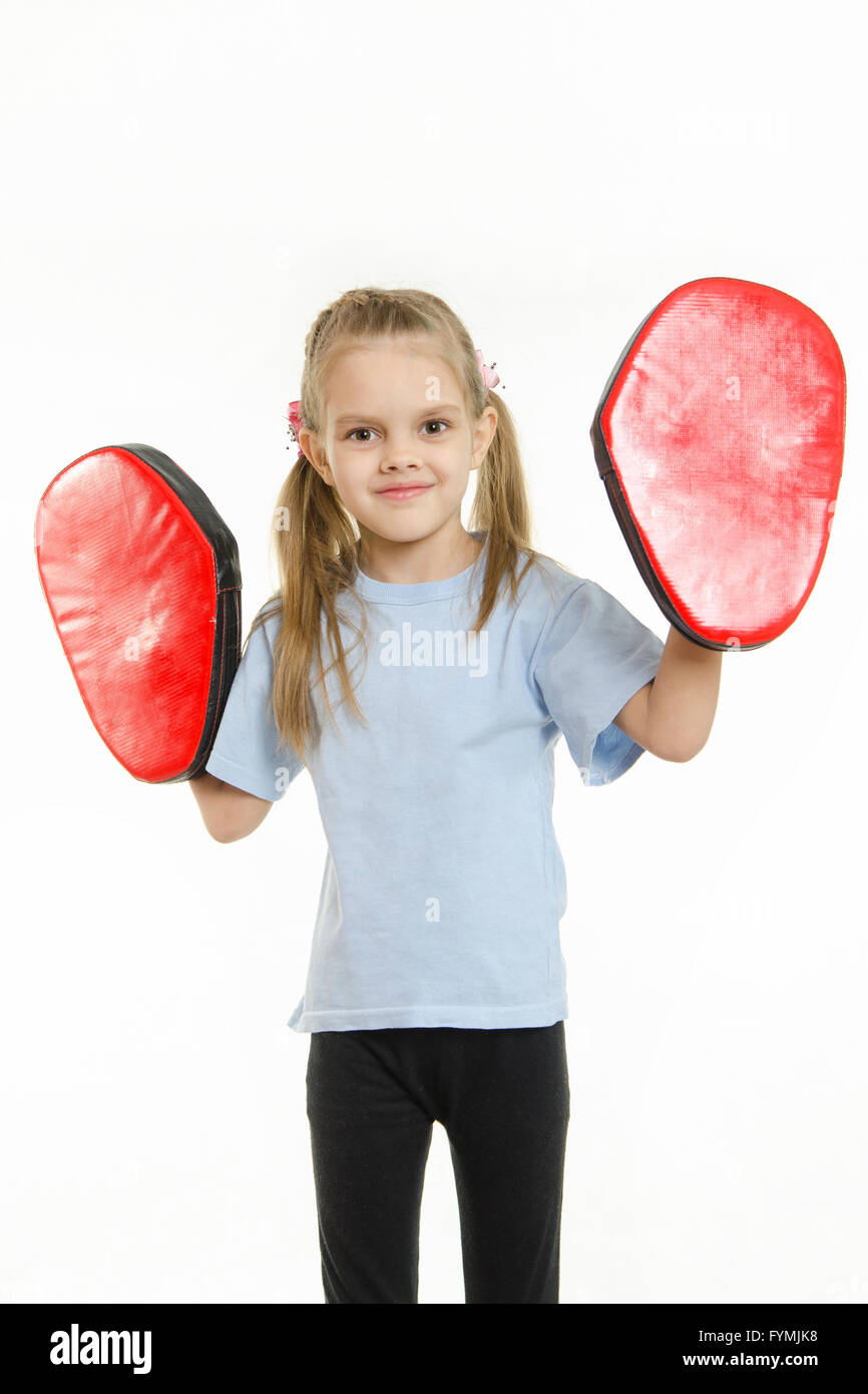 Girl with boxing paws on his hands Stock Photo - Alamy