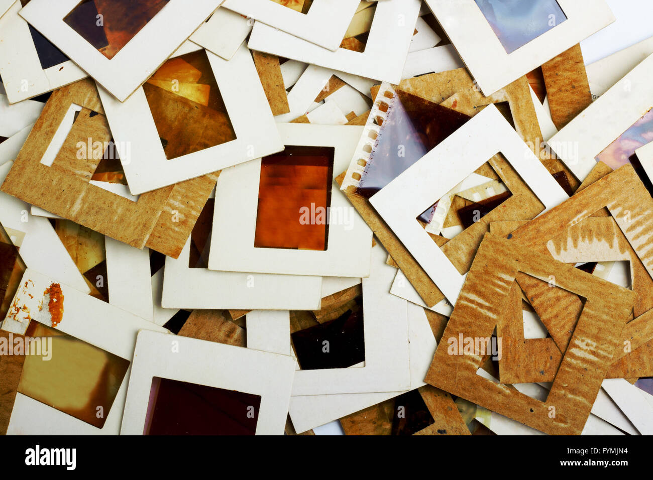 Set of old slides, photos and film on the table Stock Photo - Alamy