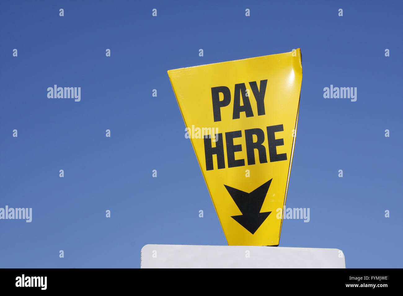 Pay Here sign Stock Photo - Alamy