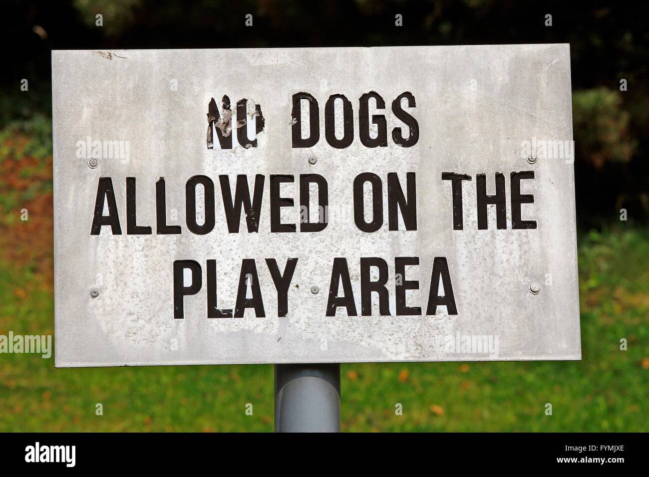 No dogs allowed on the play area sign Stock Photo - Alamy