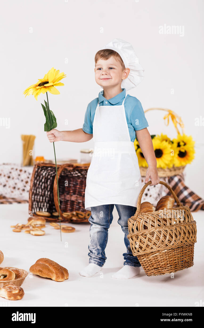 Boy chef cooking in the kitchen Stock Photo - Alamy