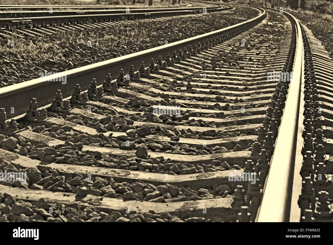 Railroad track into sepia Stock Photo - Alamy