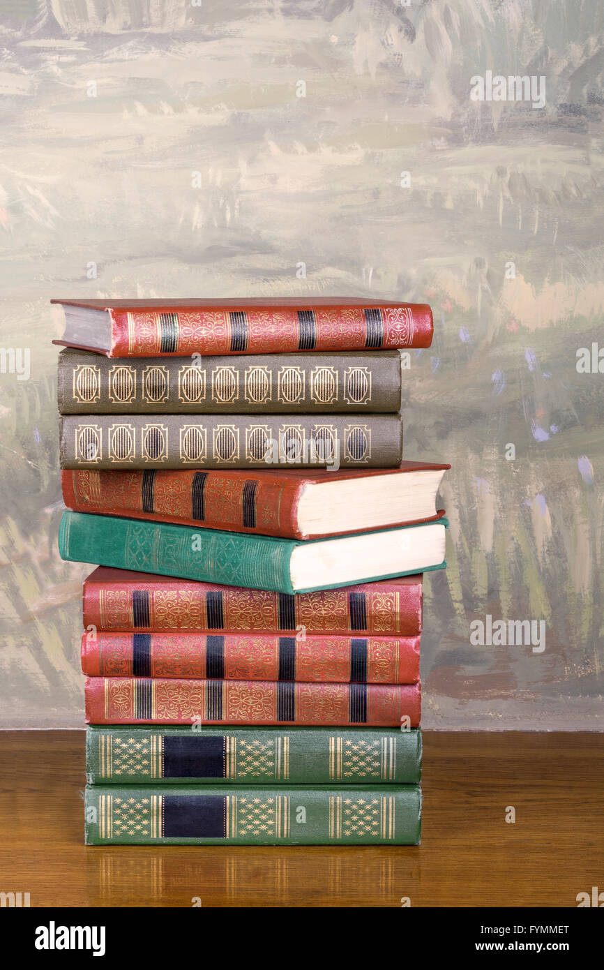 Richly decorated volumes of books with gold lettering Stock Photo - Alamy