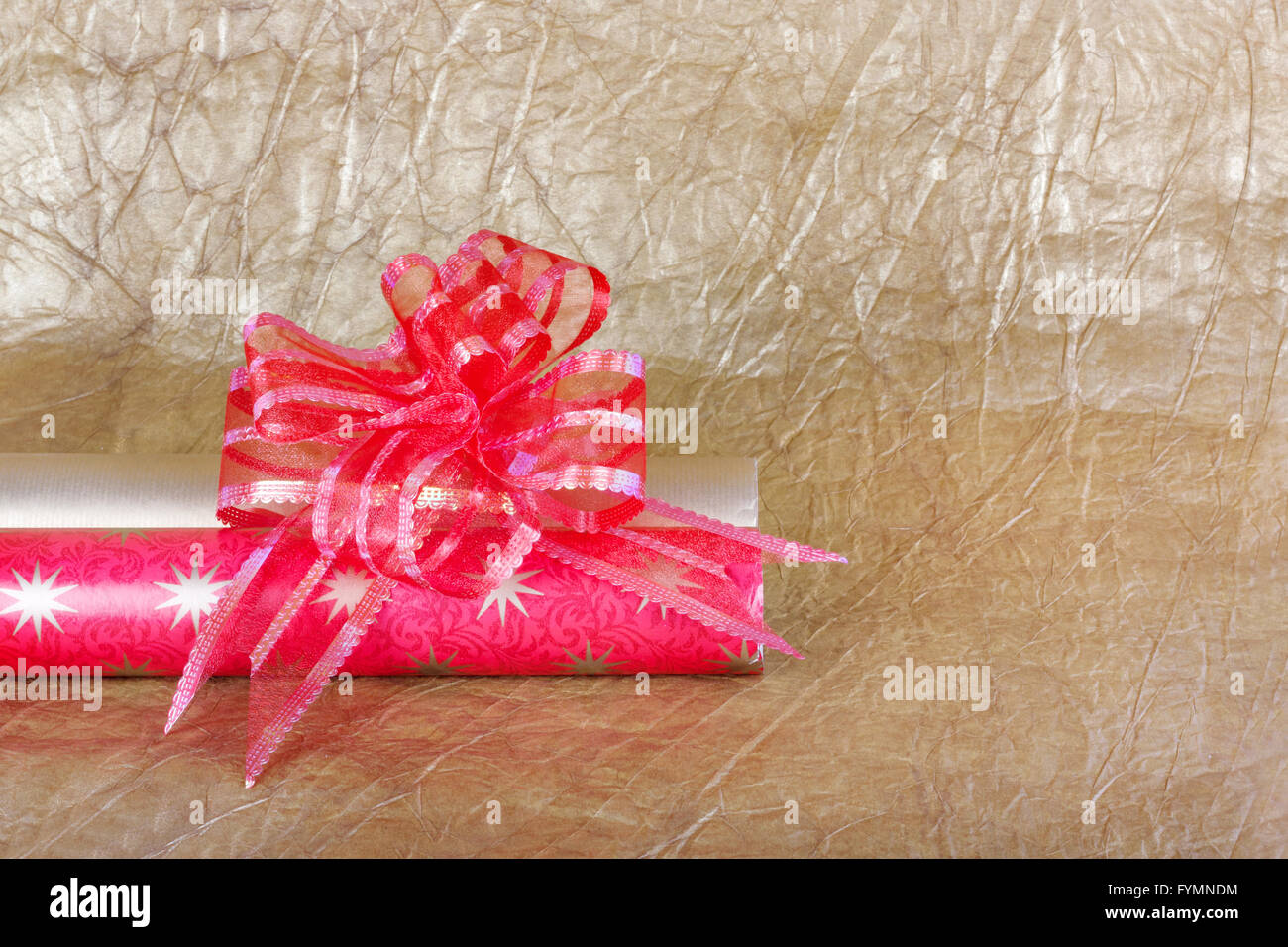 Beautiful red bow for gift decoration on gold background Stock Photo ...