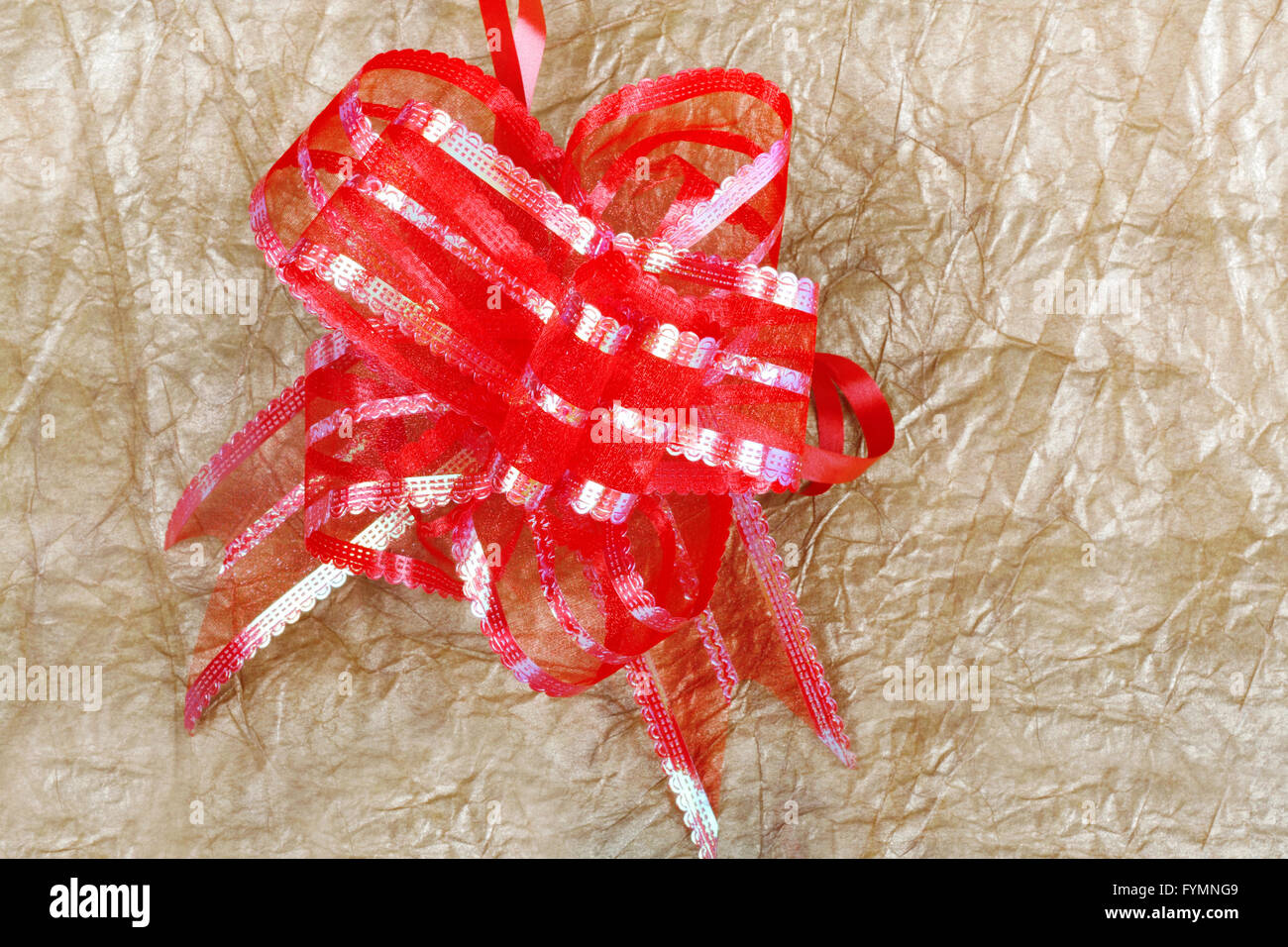 Beautiful red bow for gift decoration on abstract gold background Stock ...