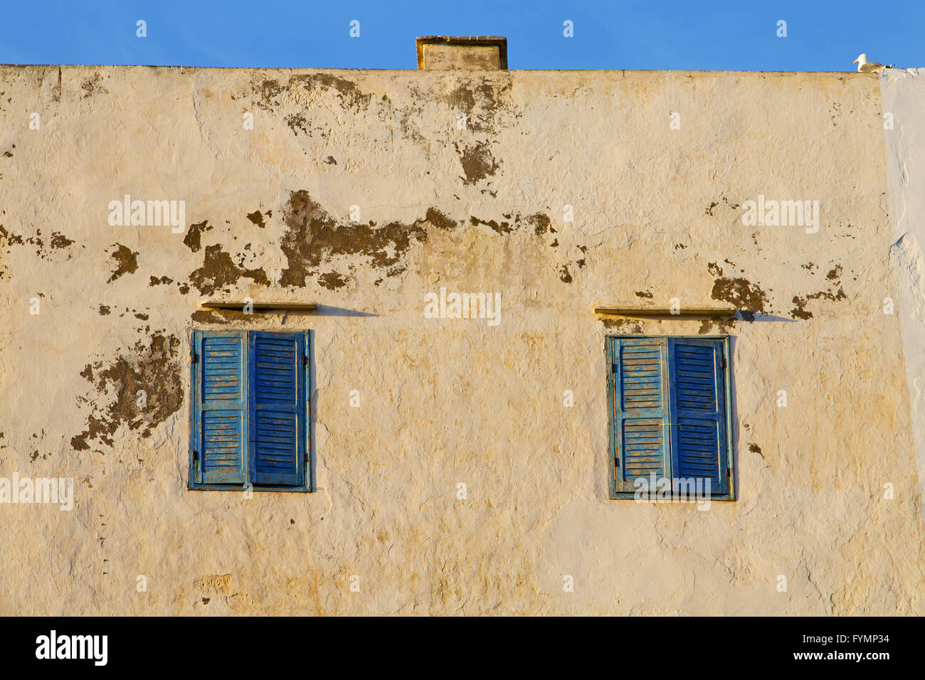 window in morocco africa and old construction wal brick historical ...