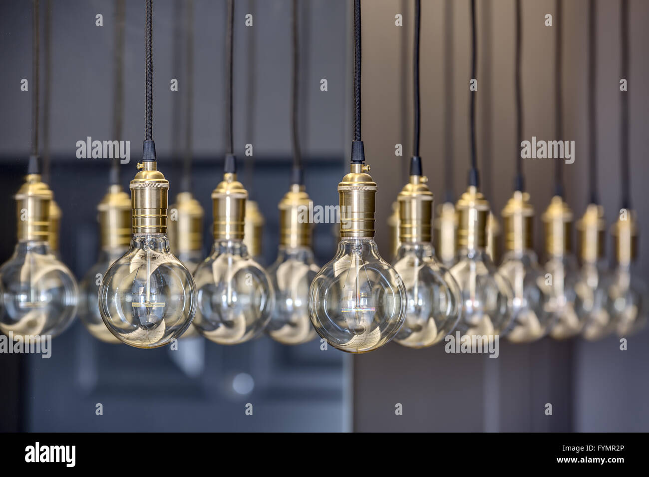 Row of hanging lamps hi-res stock photography and images - Alamy