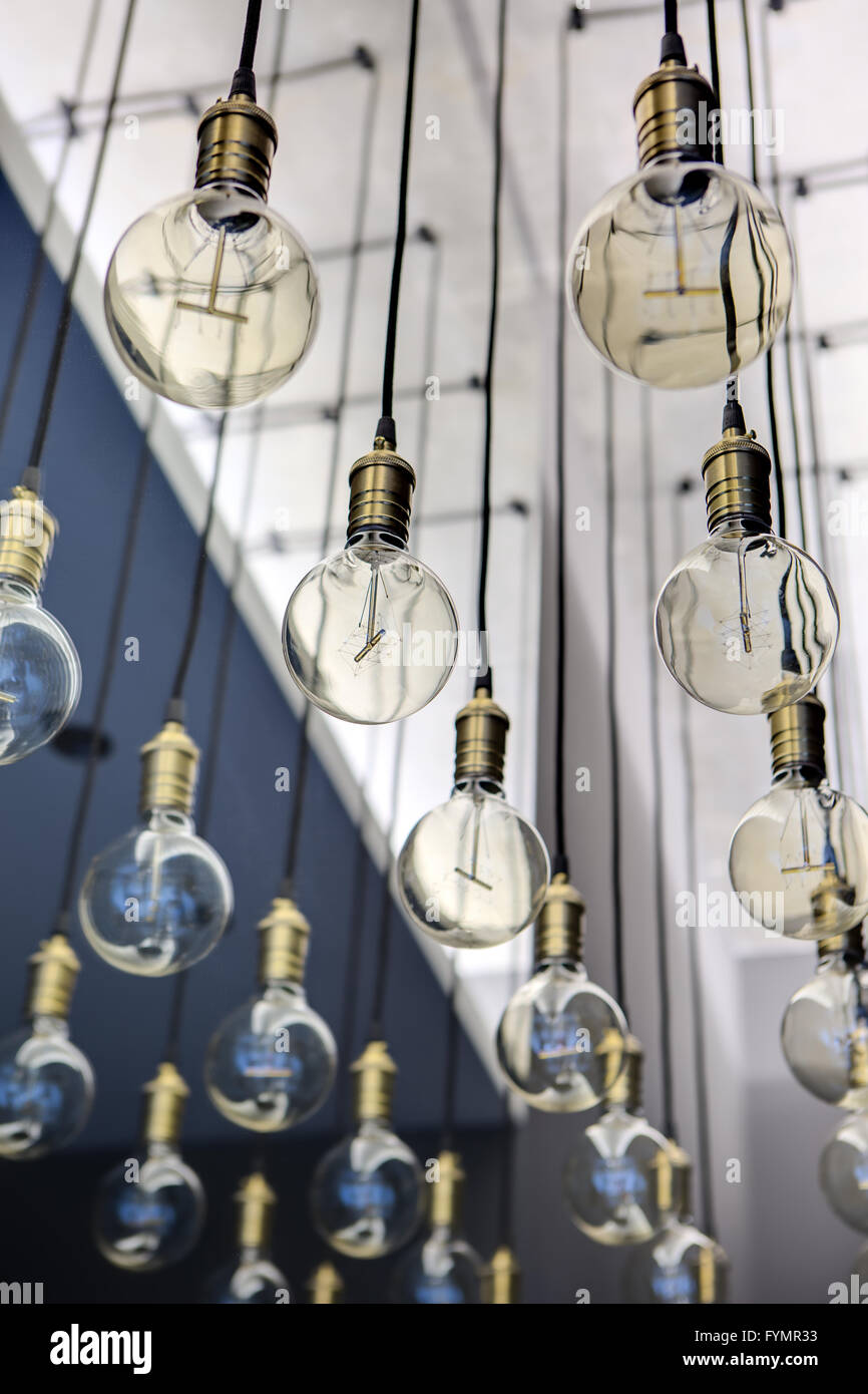 Row of hanging lamps hi-res stock photography and images - Alamy