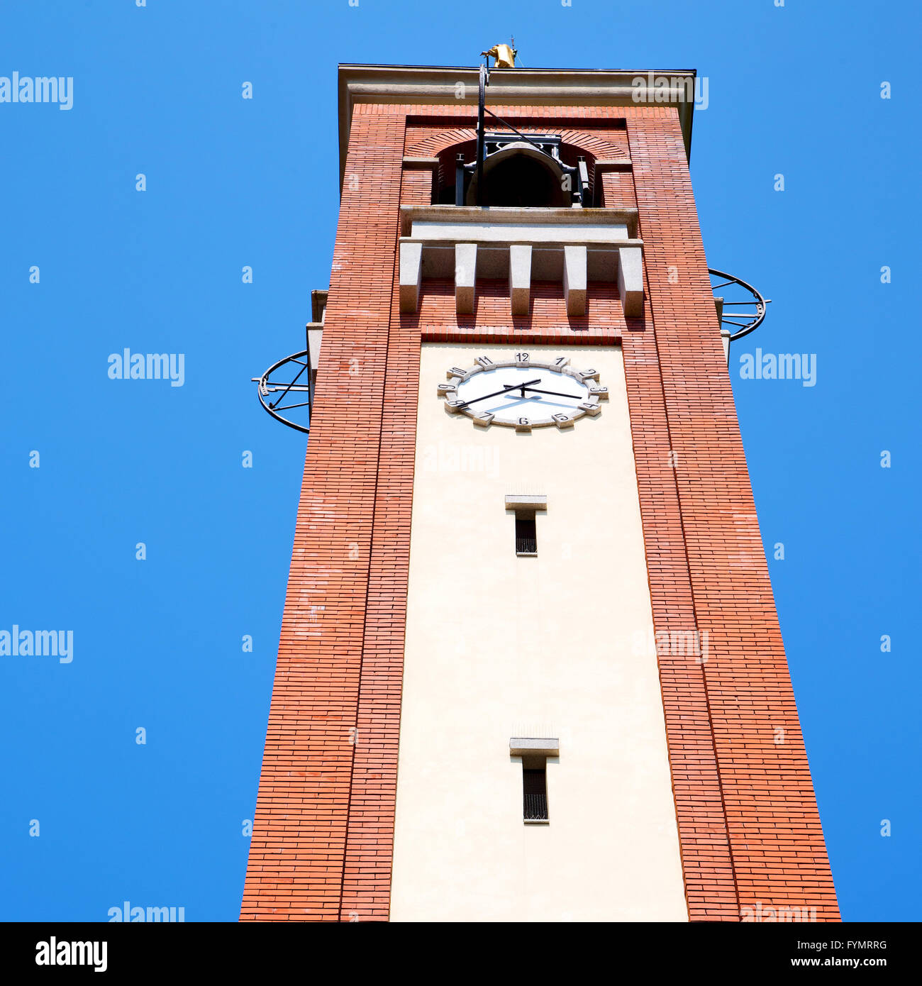 ancien clock tower in italy europe old stone and bell Stock Photo - Alamy