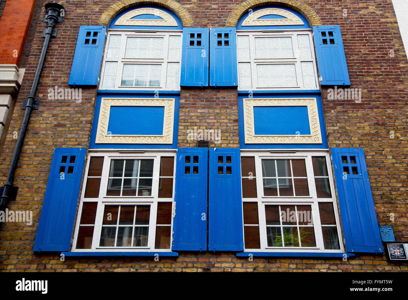 old window in europe london red brick wall and historical Stock Photo ...