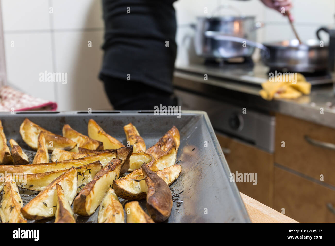 Cooking in the kitchen Stock Photo - Alamy