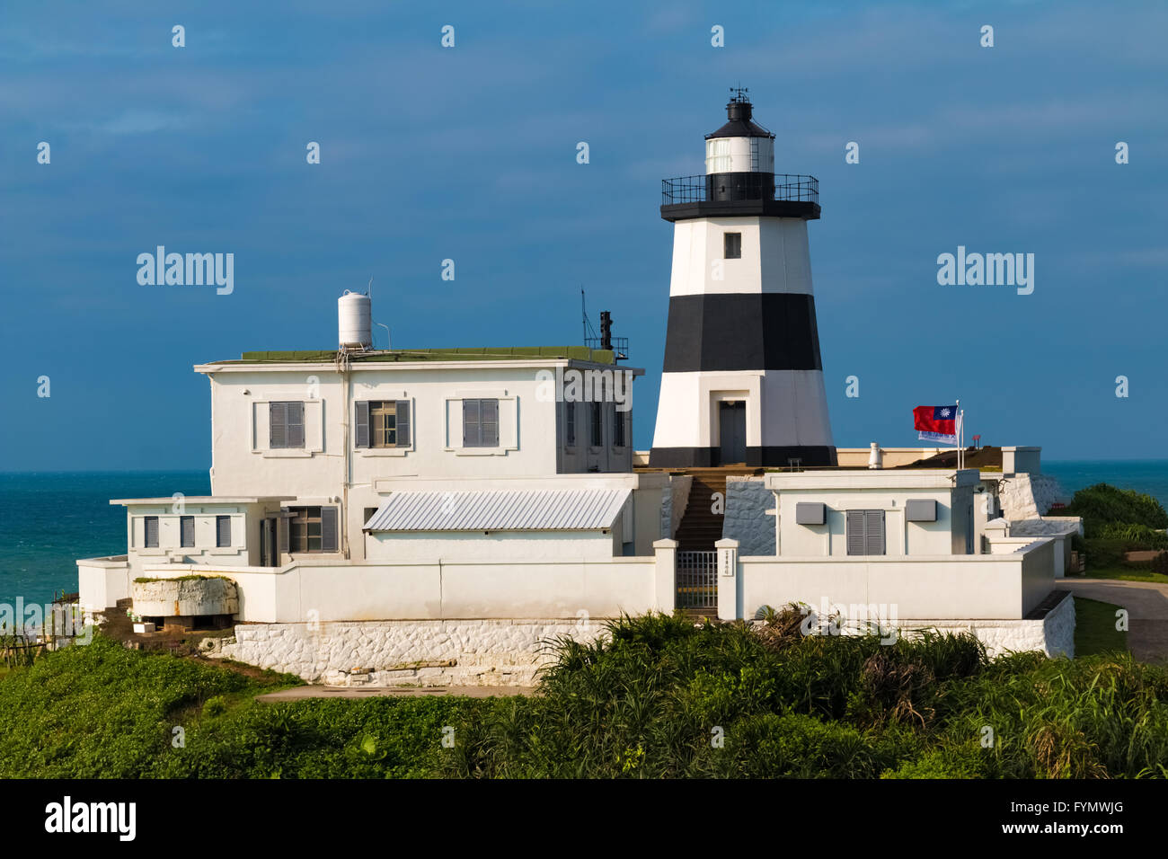 Fuguijiao lighthouse at northernmost point of Taiwan proper Stock Photo ...