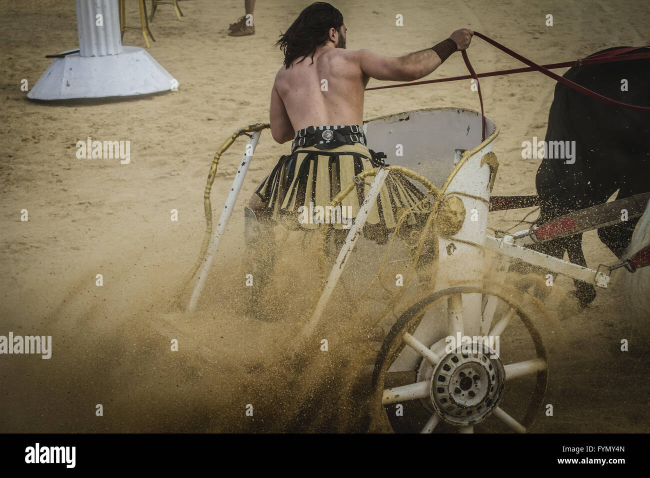 Strong, chariot race in a Roman circus, gladiators and slaves fighting ...