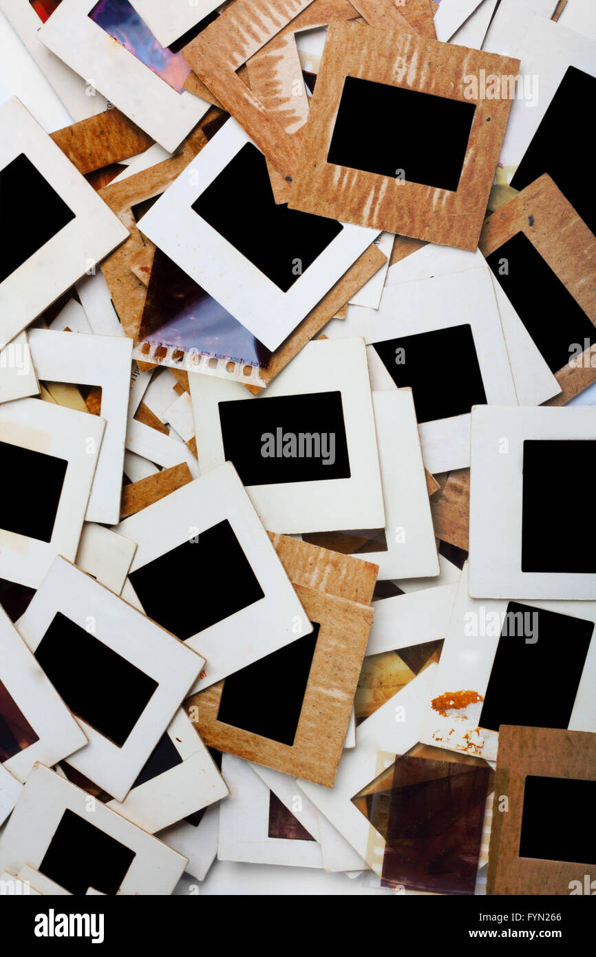 Set of old slides, photos and film on the table Stock Photo - Alamy