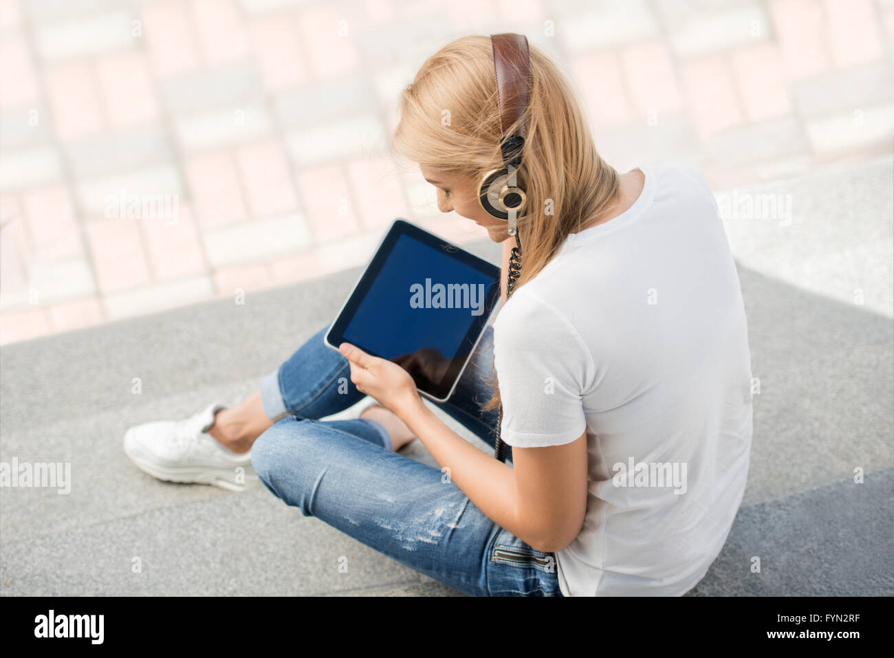 Surfing with music Stock Photo - Alamy