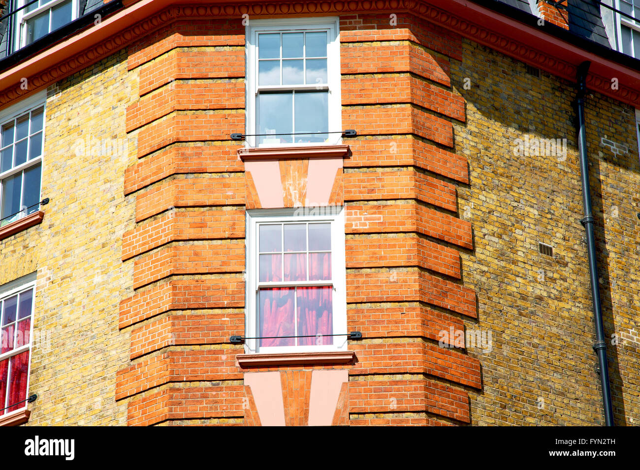 window in europe london old red and historical Stock Photo - Alamy