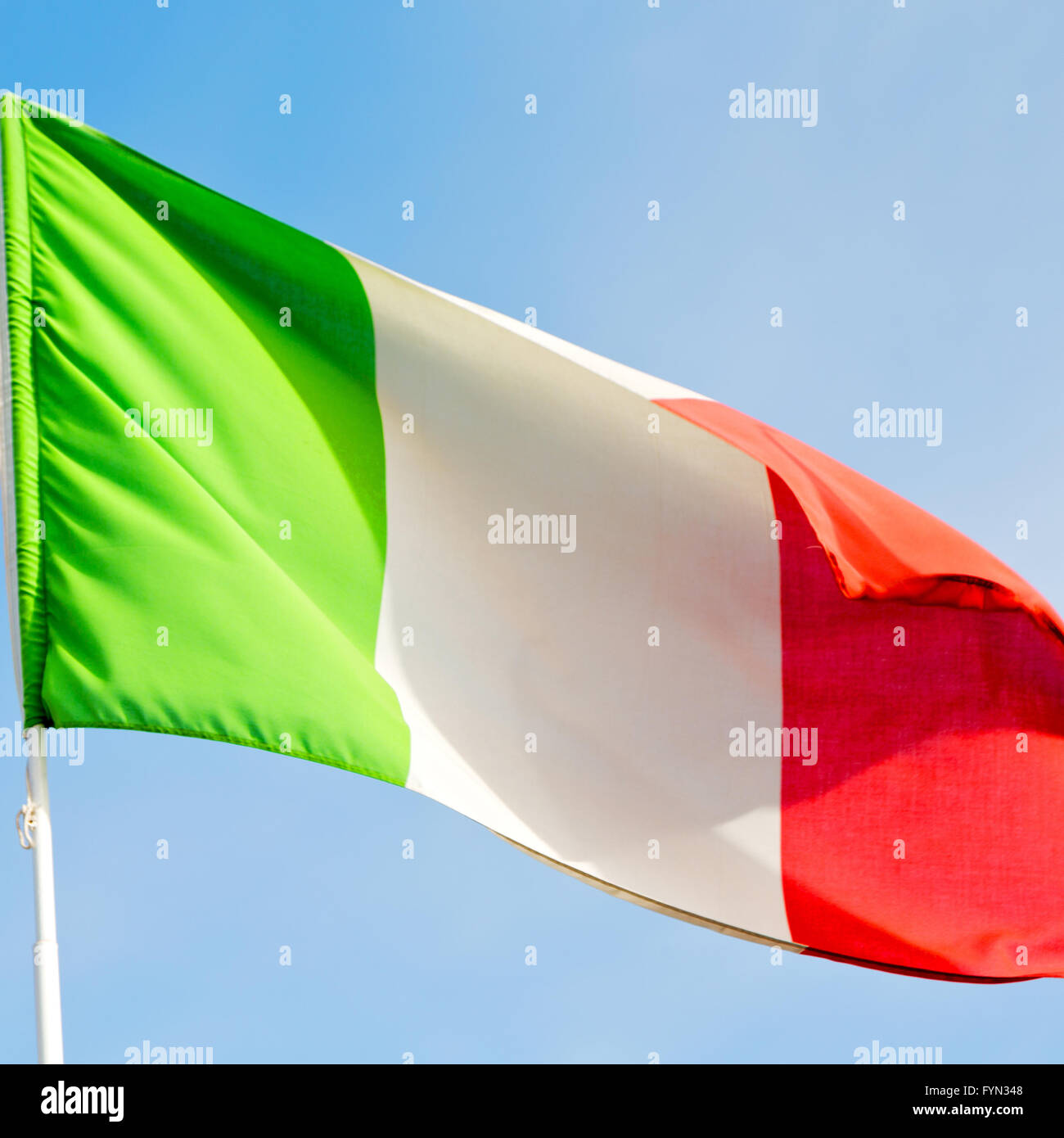 italy waving flag in the blue sky colour and wave Stock Photo - Alamy