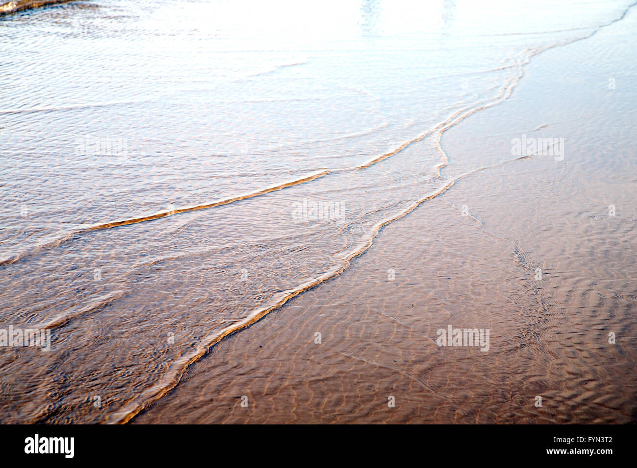 dune morocco africa wet sand beach ocean Stock Photo - Alamy