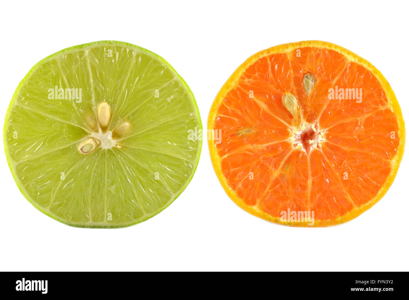 Halves of lime and orange on white background Stock Photo - Alamy