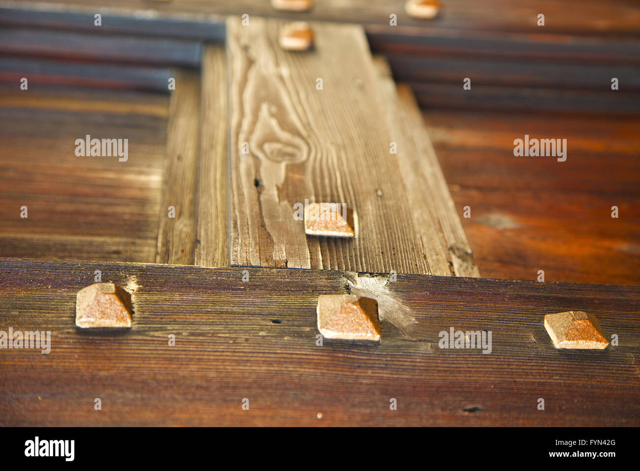 red abstract house door in italy closed nail rusty Stock Photo - Alamy