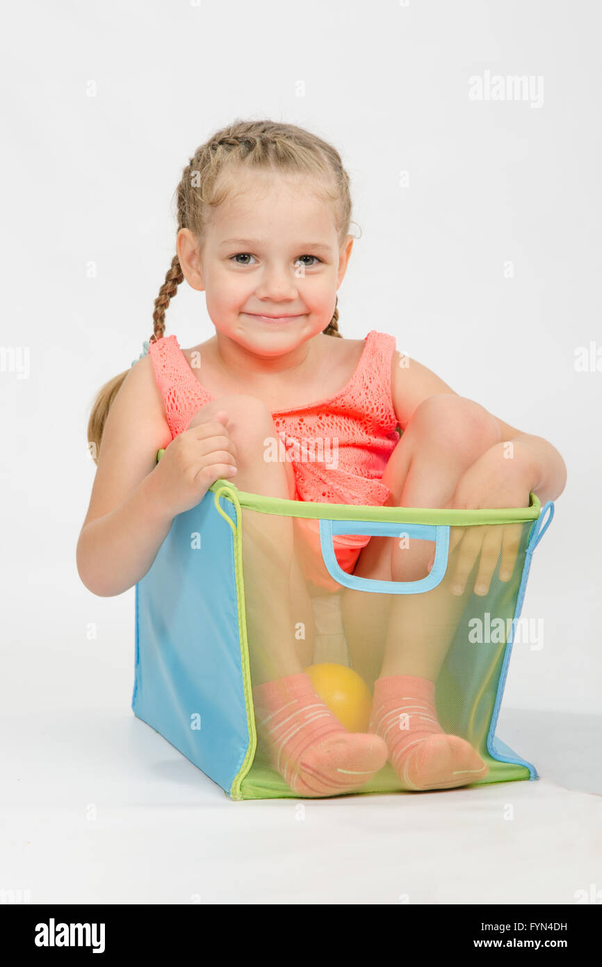 Girl in a box hi-res stock photography and images - Alamy