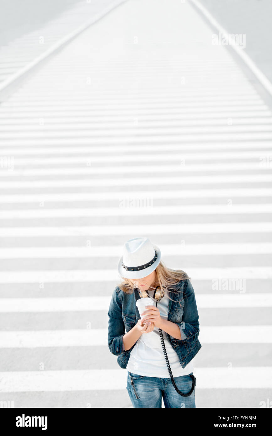 Walking on zebra cross Stock Photo - Alamy