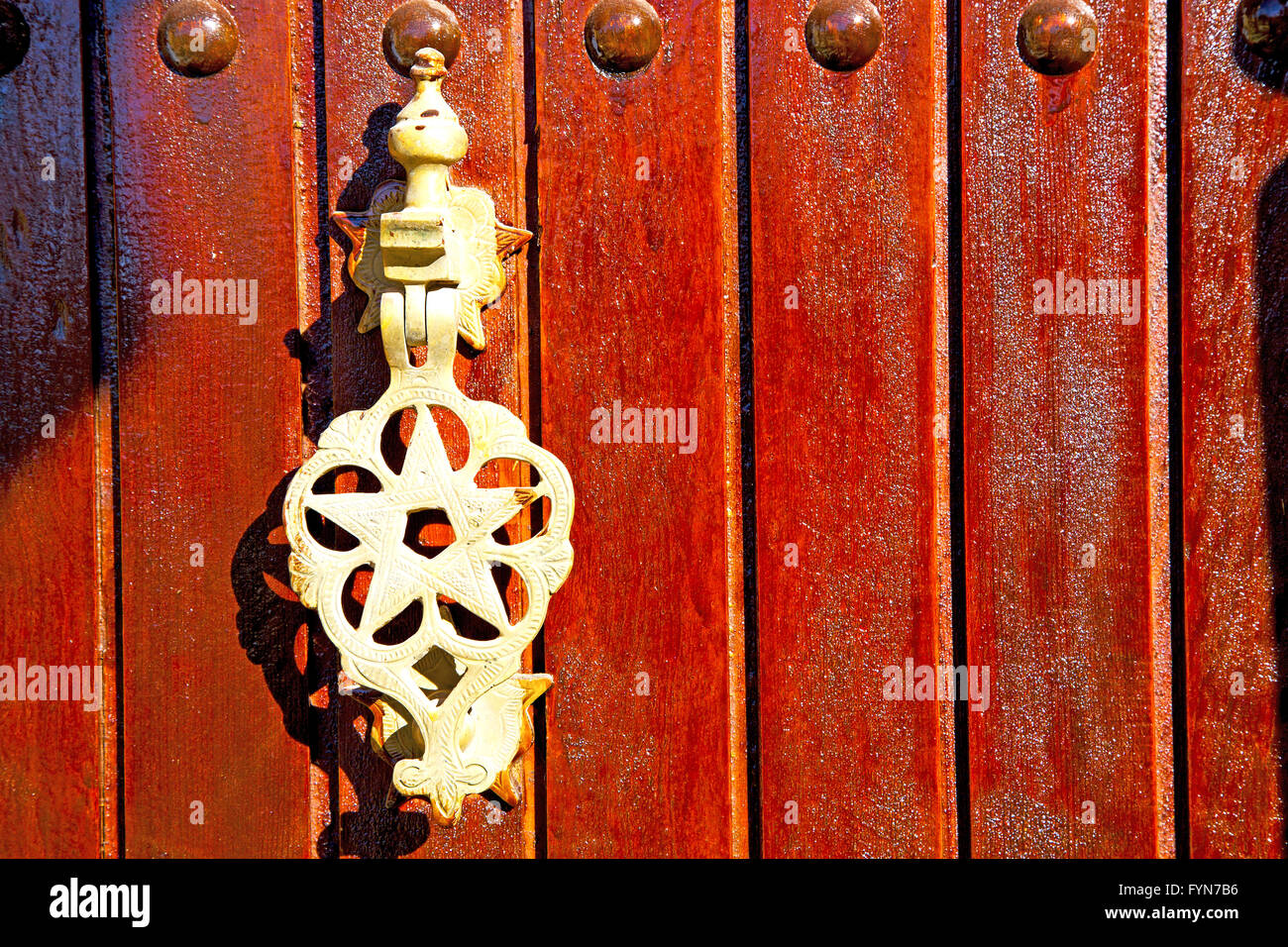 red in africa the old wood facade home and rusty safe padlock Stock ...