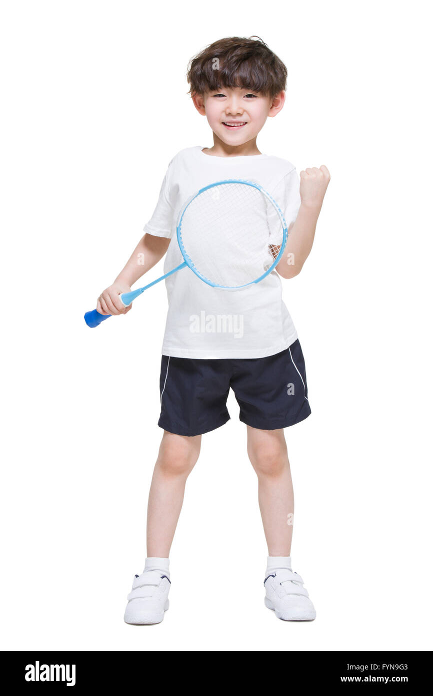 Cute boy playing badminton Stock Photo - Alamy