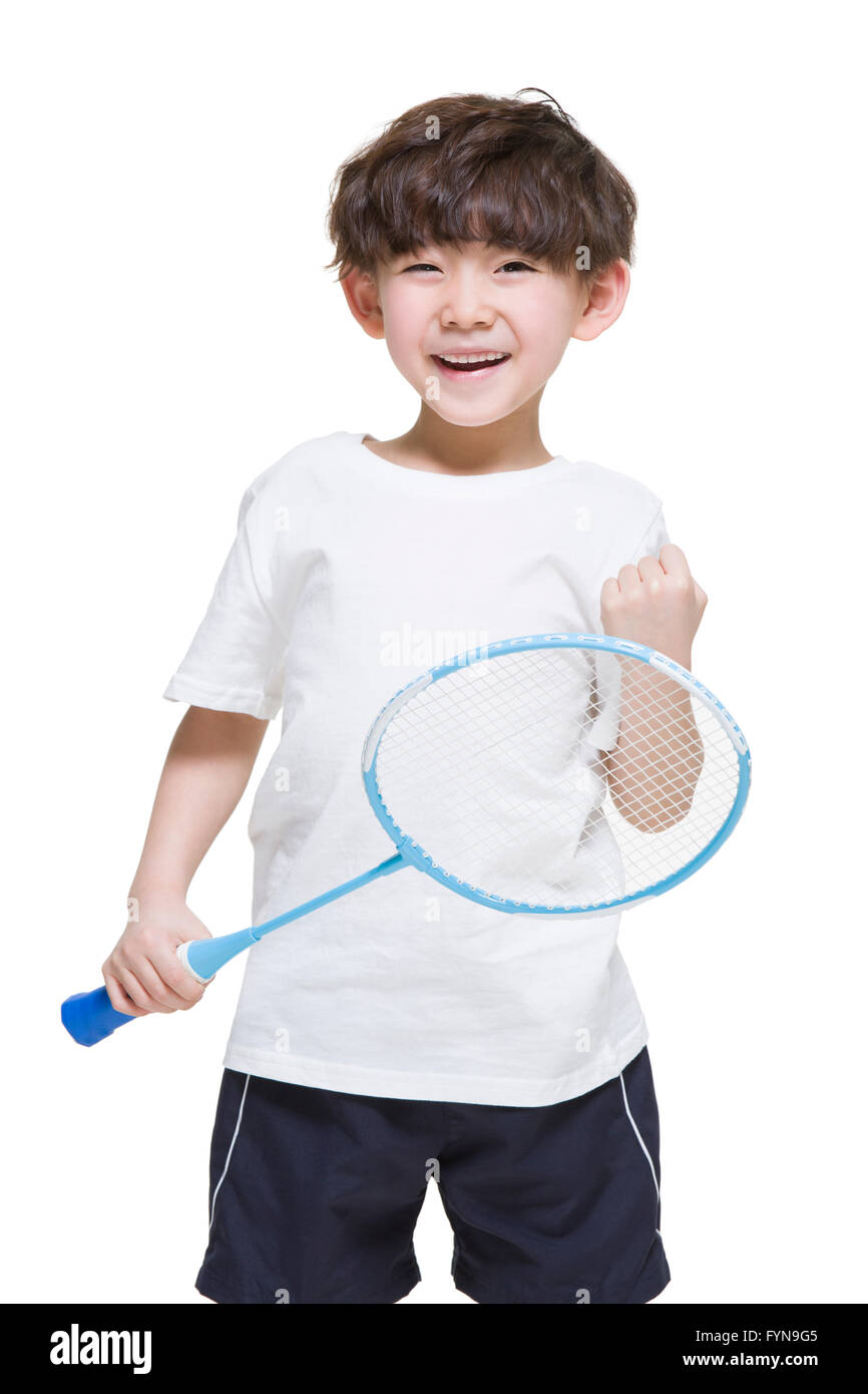 Cute boy playing badminton Stock Photo - Alamy