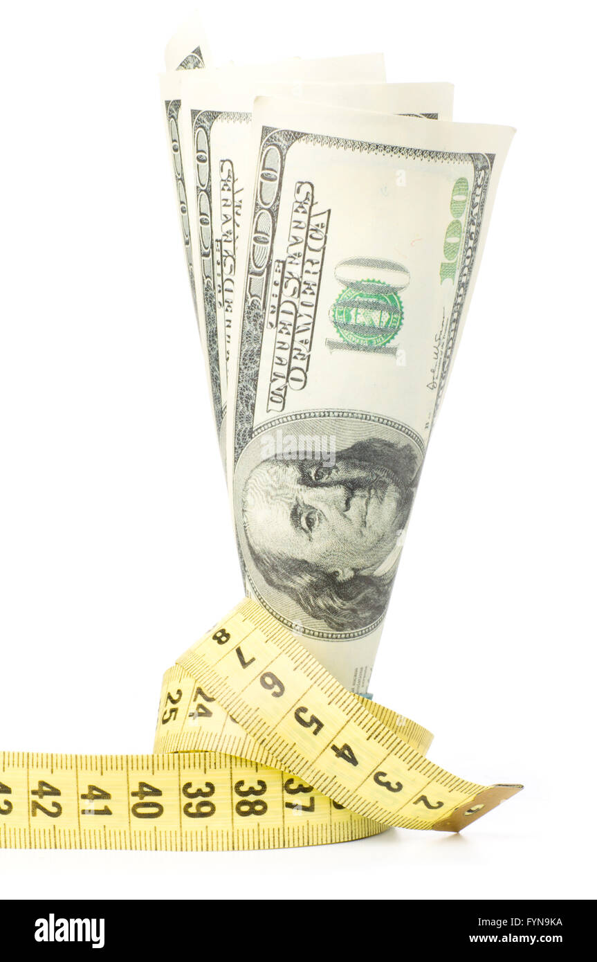 dollars with yellow metre Stock Photo - Alamy