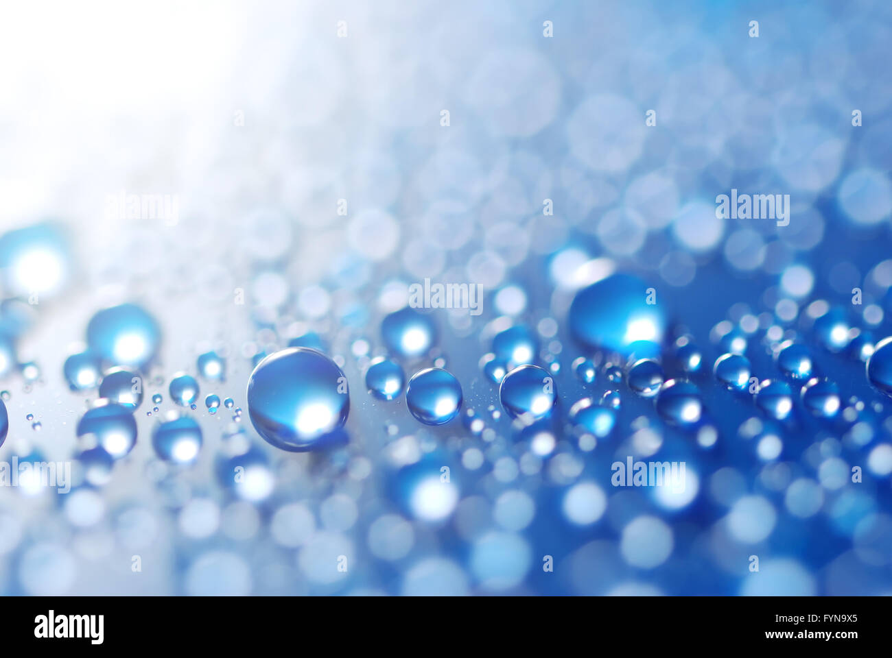 flying blue water drops Stock Photo - Alamy