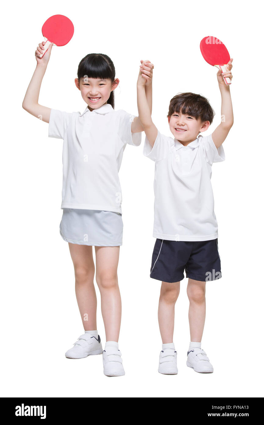 Cute children playing table tennis Stock Photo - Alamy