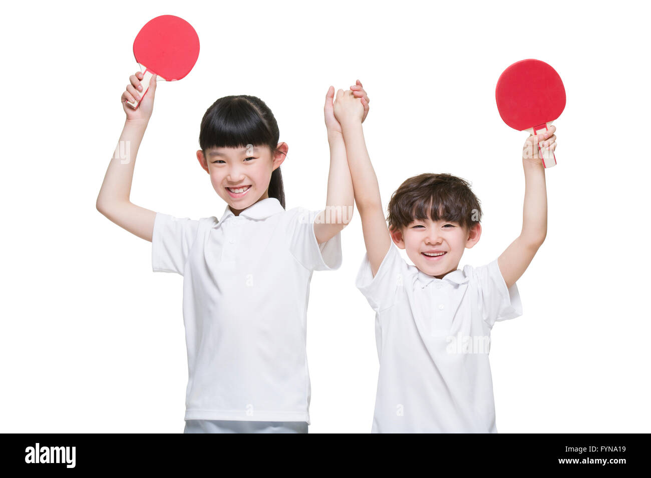Cute children playing table tennis Stock Photo - Alamy