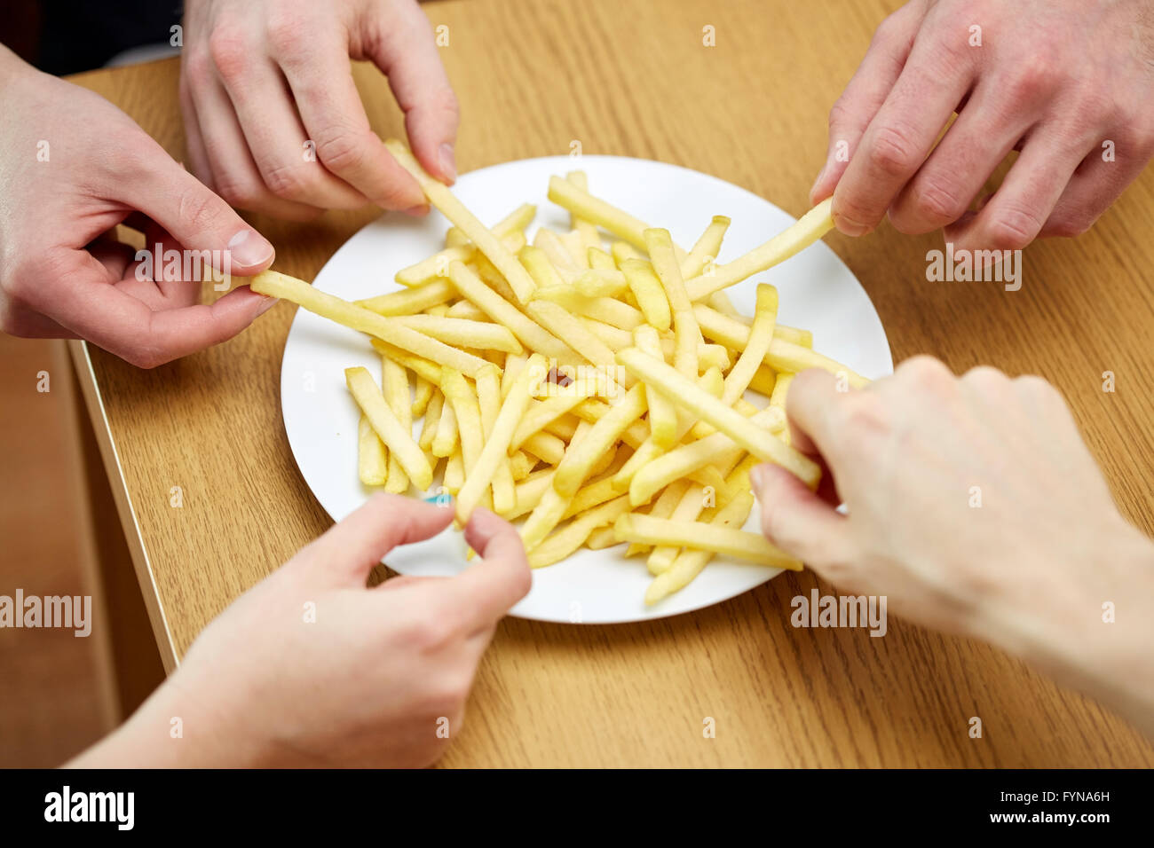 Eating french fries hi-res stock photography and images - Alamy