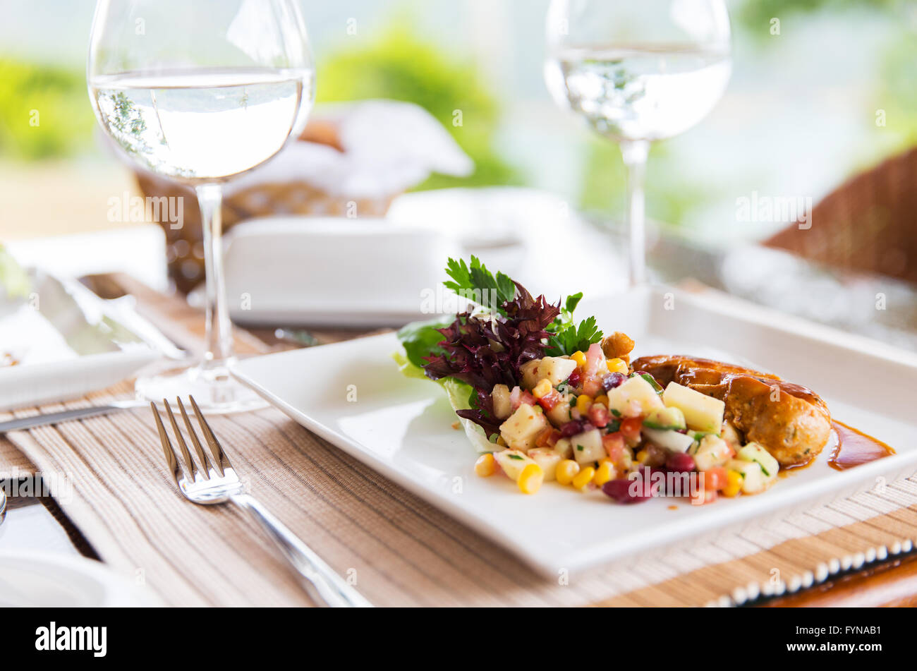close up of food and water glasses at restaurant Stock Photo - Alamy