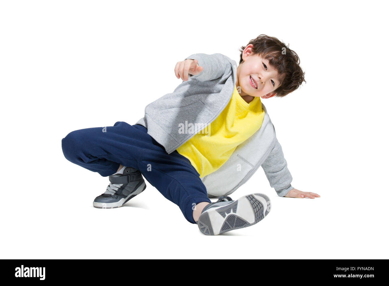 Cute boy break dancing Stock Photo - Alamy