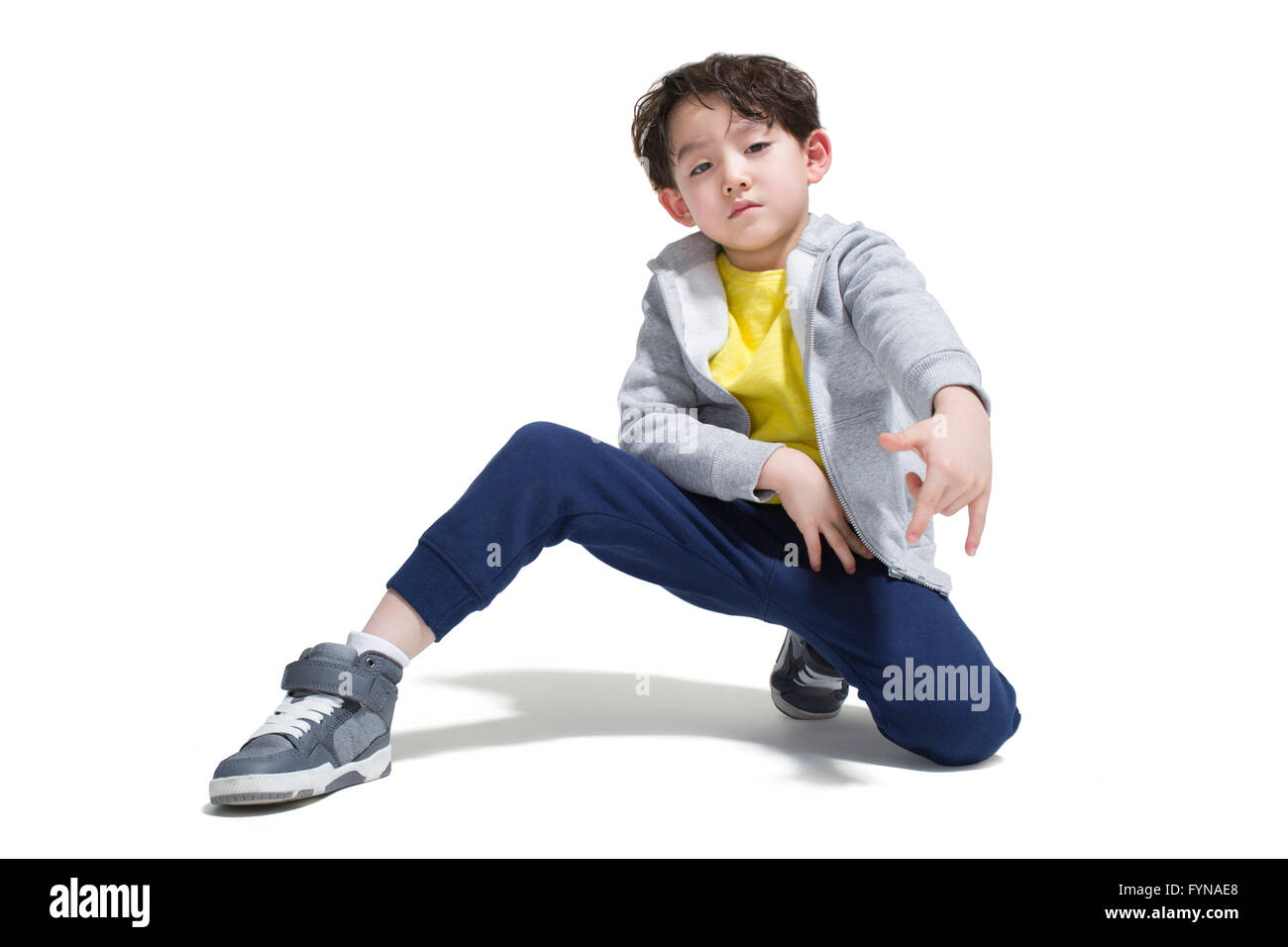 Cute boy break dancing Stock Photo - Alamy