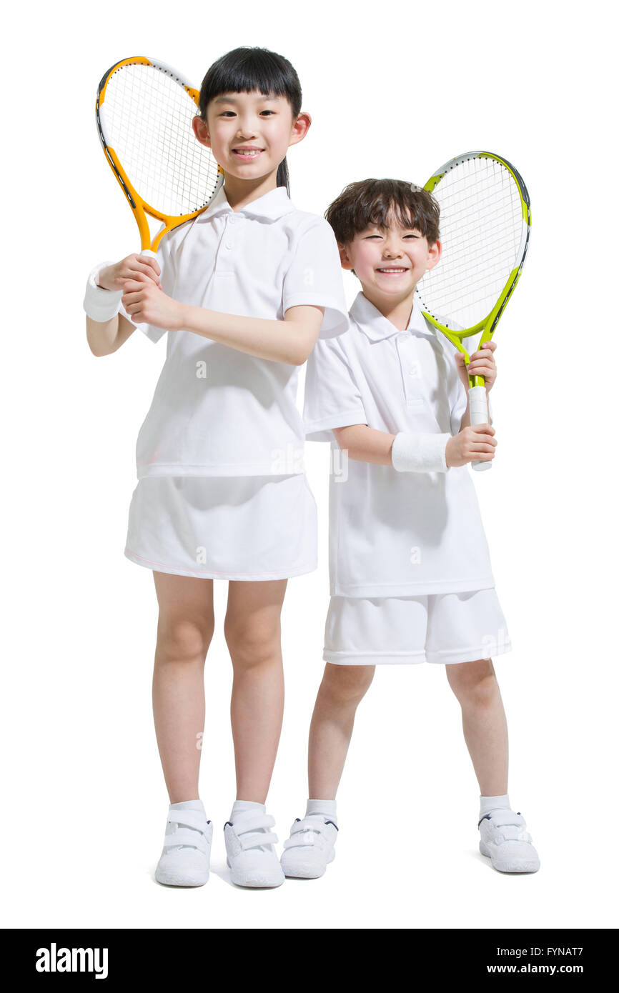 Cute children playing tennis Stock Photo - Alamy