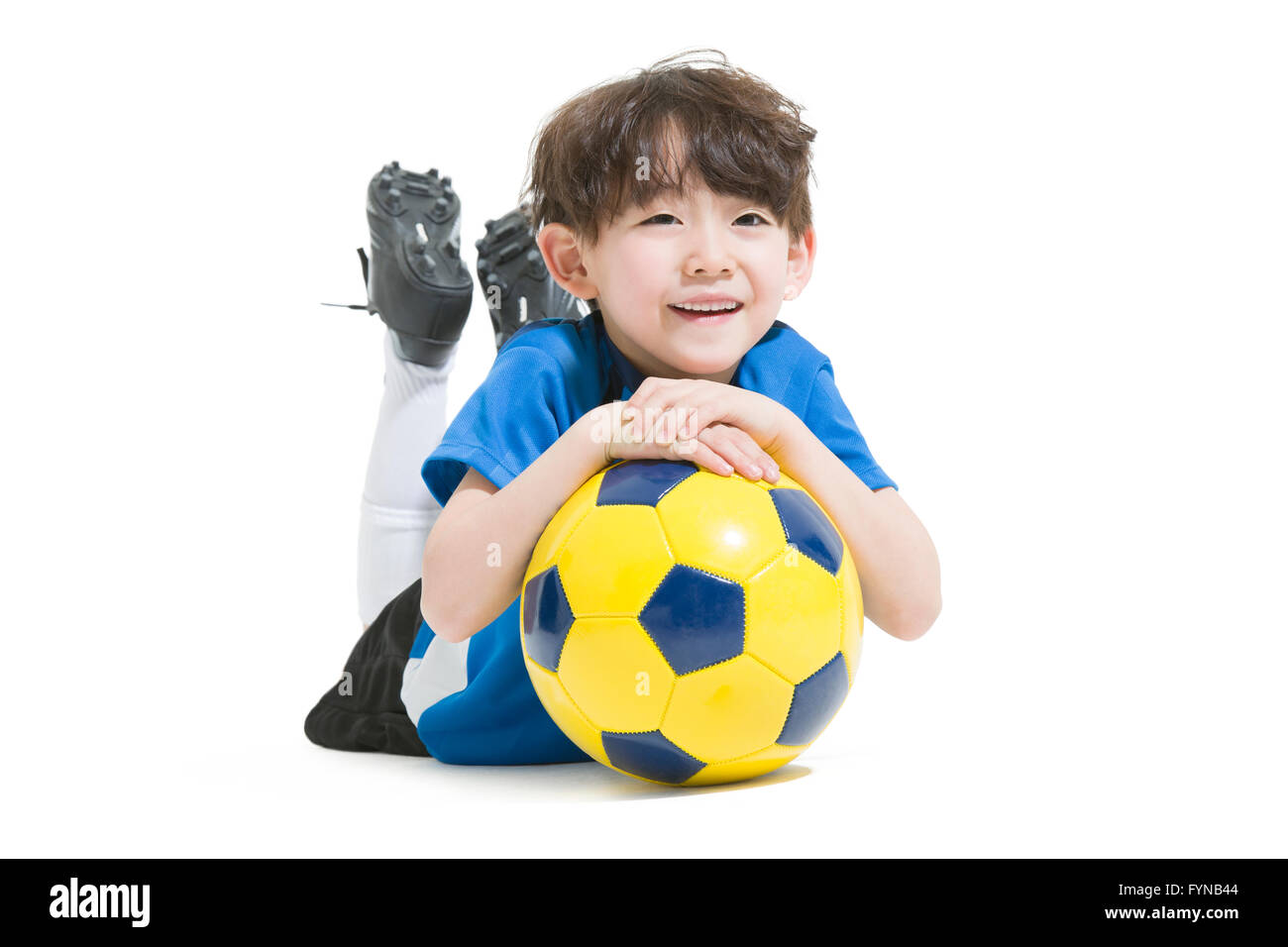 Cute boy and soccer ball Stock Photo - Alamy