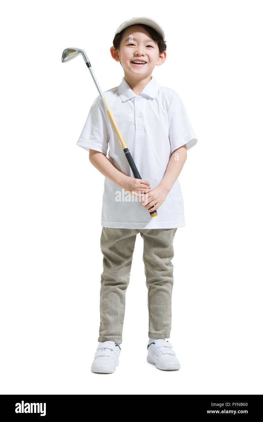 Cute boy playing golf hi-res stock photography and images - Alamy